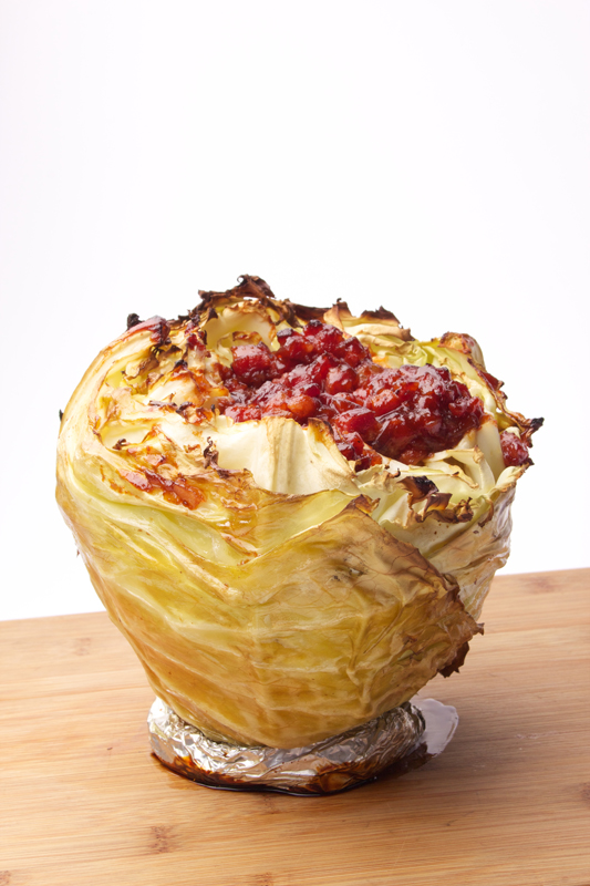 Grilled oxheart cabbage stuffed with onion, bacon, and barbecue sauce ...