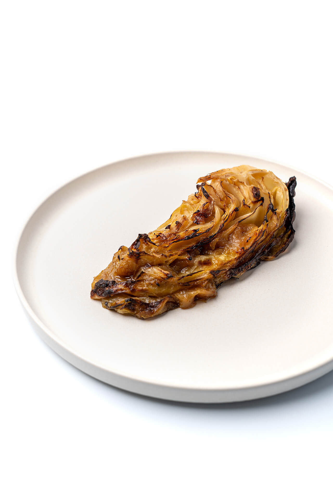 Oxheart cabbage with mushroom garum | Gastronomixs